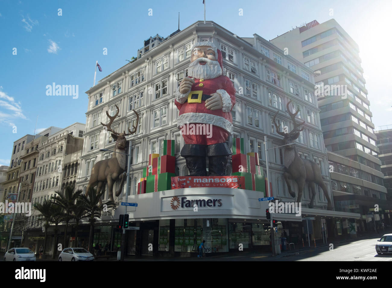 A giant santa figure in front of Farmers store in Auckland, New Zealand ...