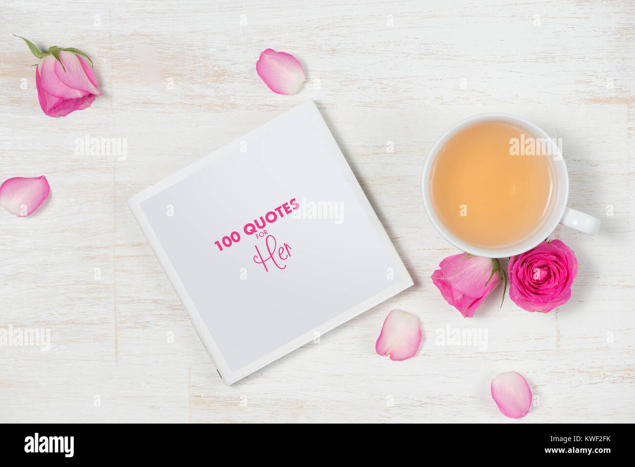 Tea time. Light background with flowers and cup of tea Stock Photo - Alamy