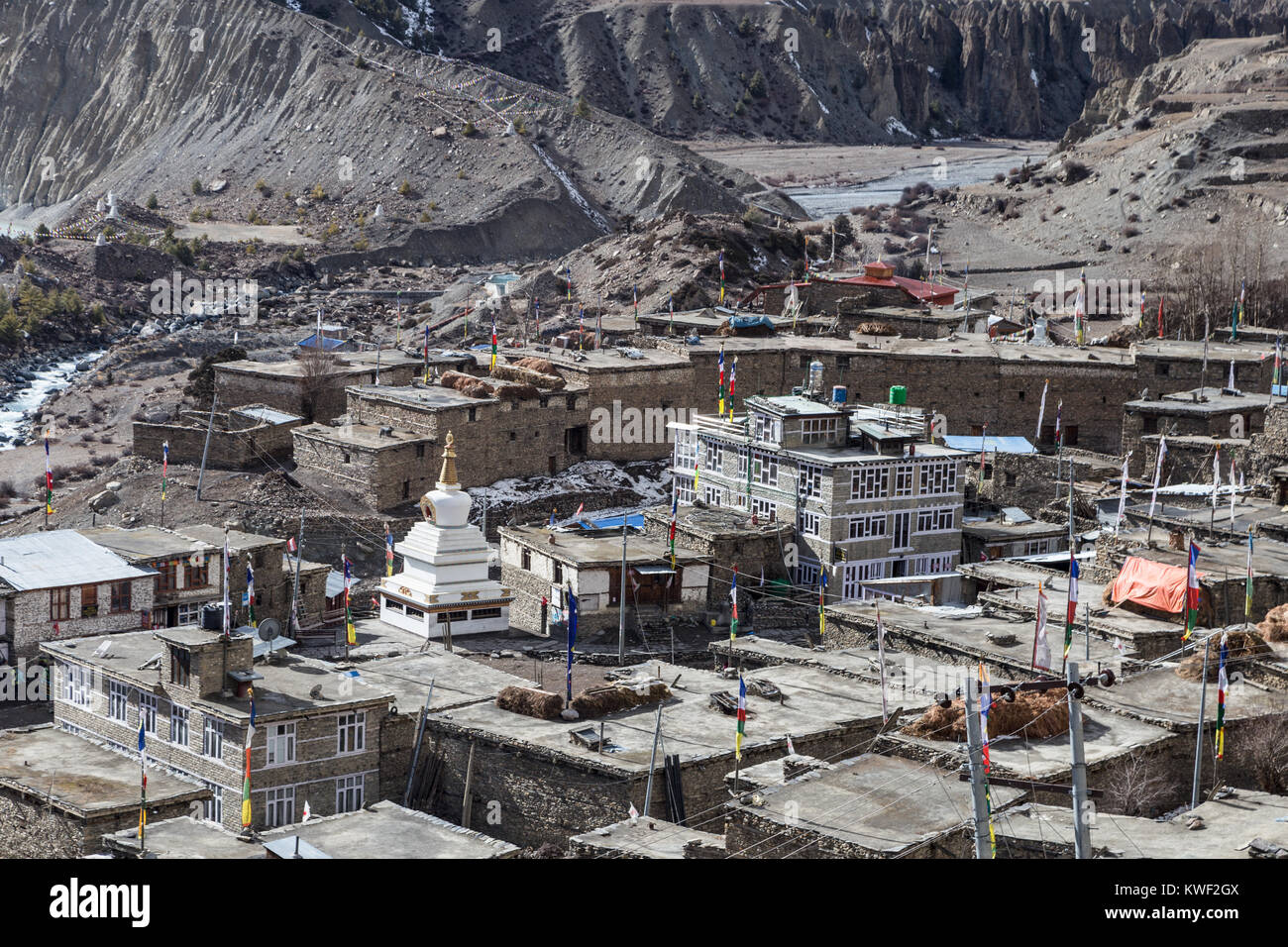 Aerial view of the village of Manang with its Tibetan Buddhist stupa in ...