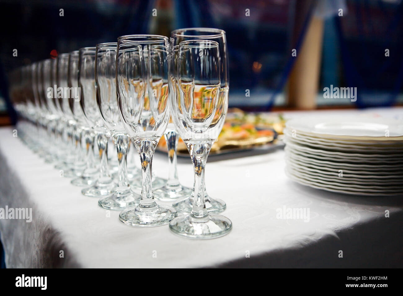 Empty Glasses and plates on restaurant table before party begins Stock ...
