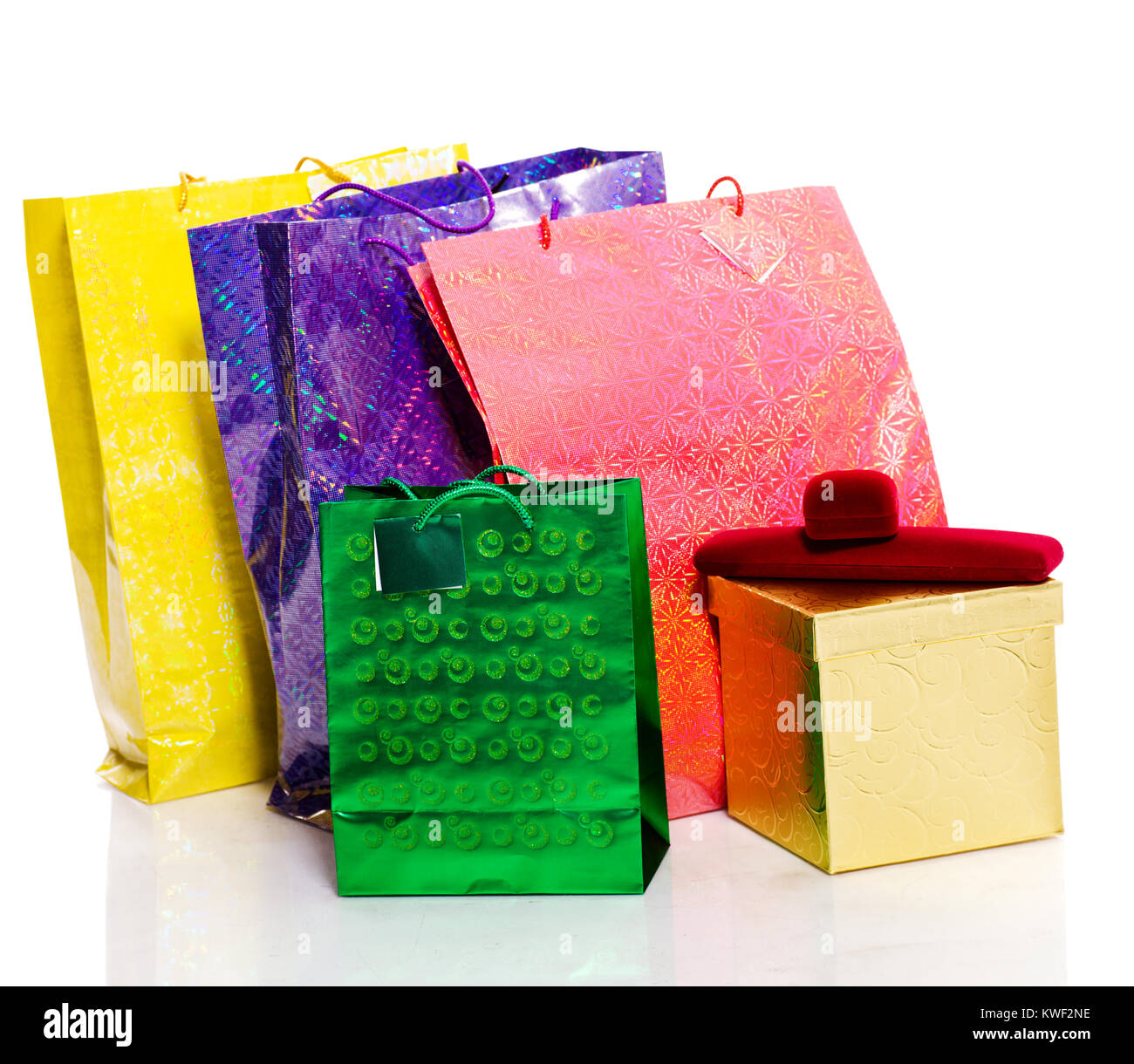 Bunch colorful paper bags for gifts isolated on white Stock Photo - Alamy