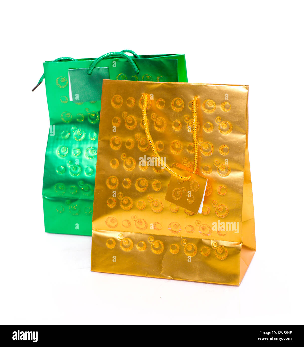 Two colorful paper bags for gifts isolated on white Stock Photo - Alamy