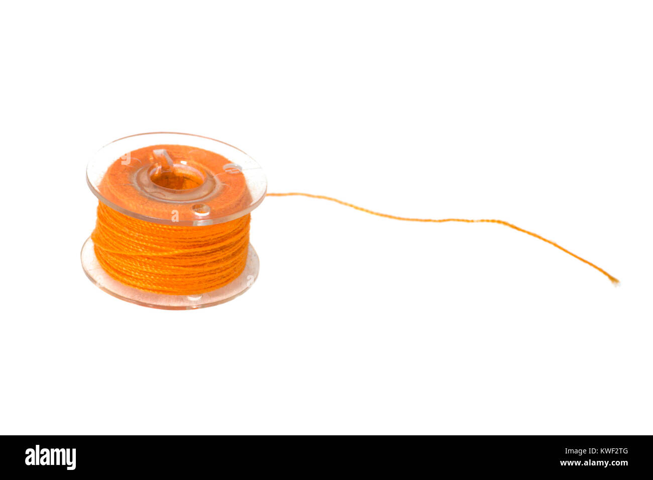 spool of vivid orange thread isolated on white Stock Photo - Alamy