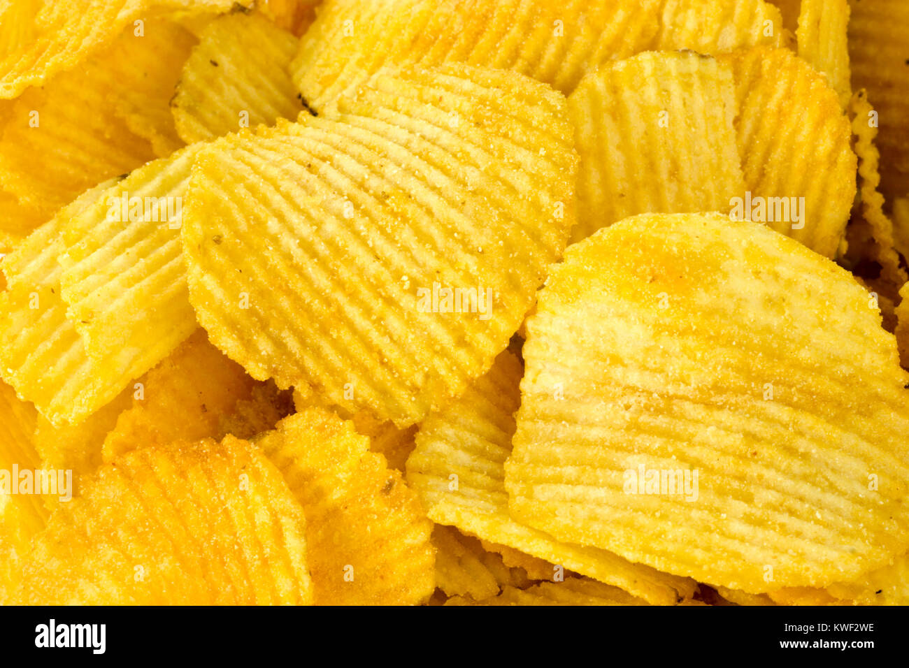 Potato Chips yellow crisp abstract tasty background Stock Photo - Alamy