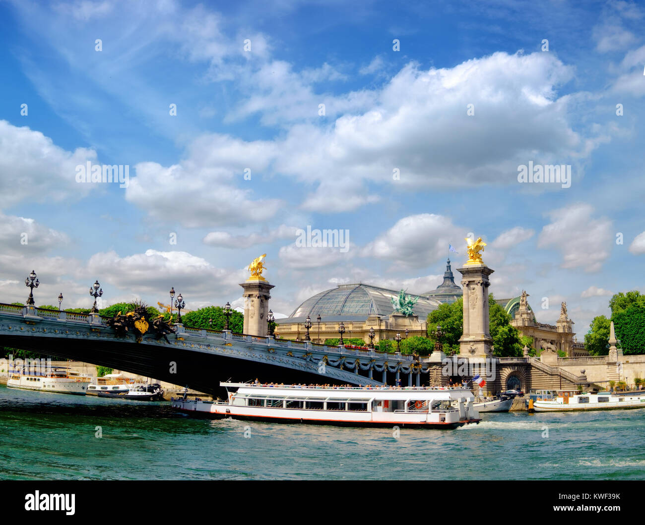 Paris, France, passenger ship passes under Alexander III bridge on ...