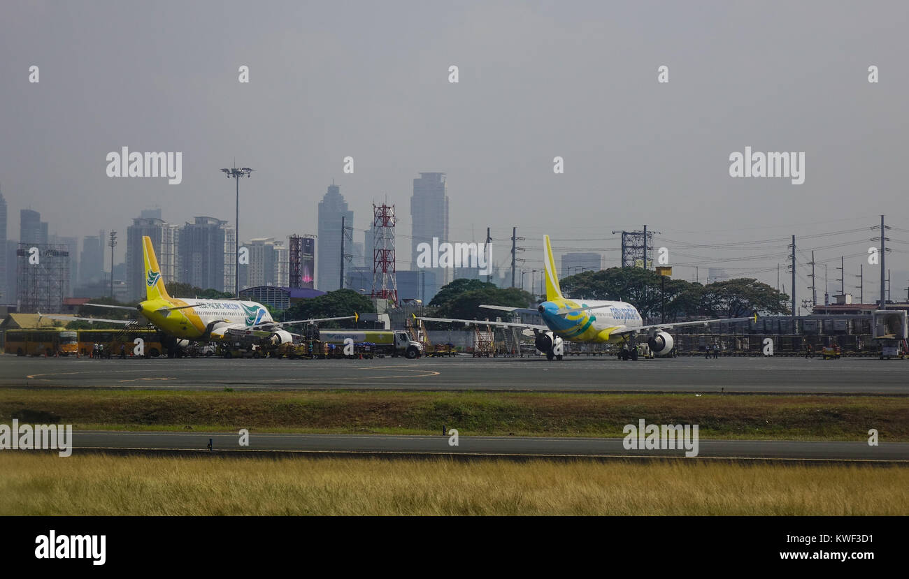Manila, Philippines - Apr 12, 2017. Airplanes docking at Ninoy Aquino ...
