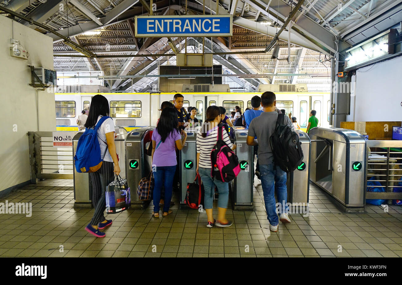 Manila, Philippines - Apr 12, 2017. People coming to LRT Station in ...