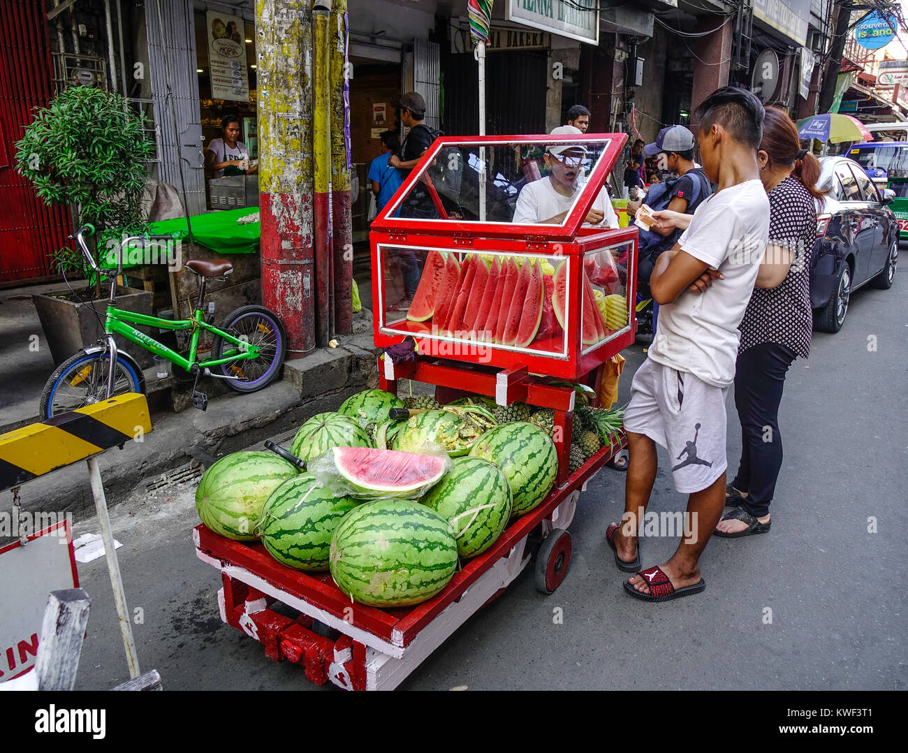 Manila, Philippines - Apr 12, 2017. Selling watermelon on street in ...
