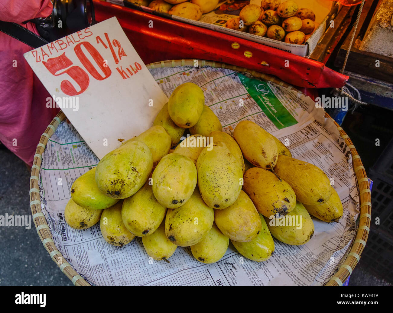 Manila, Philippines - Apr 12, 2017. Selling yellow mangoes on street in ...
