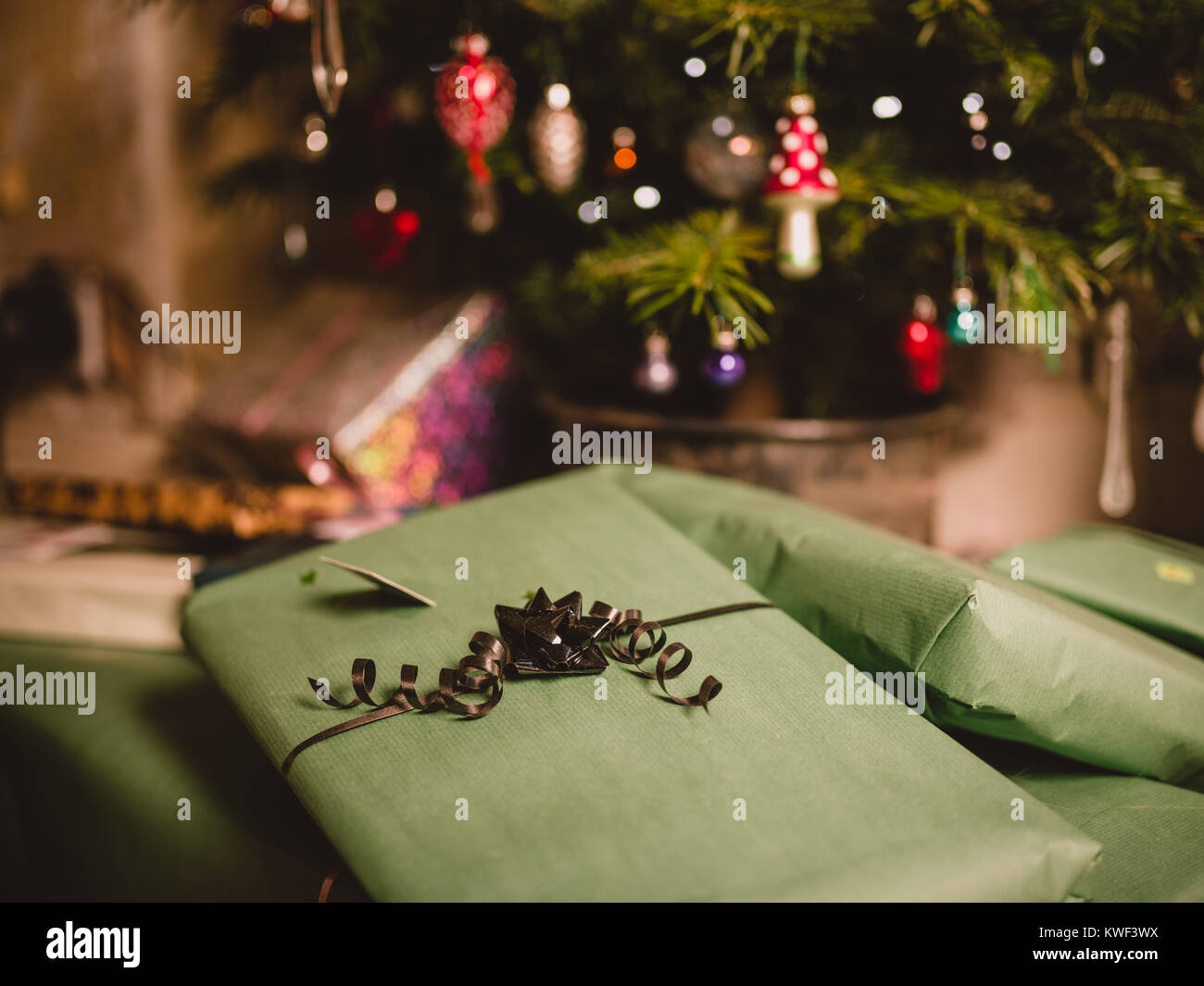 A bunch of presents under the christmas tree Stock Photo - Alamy
