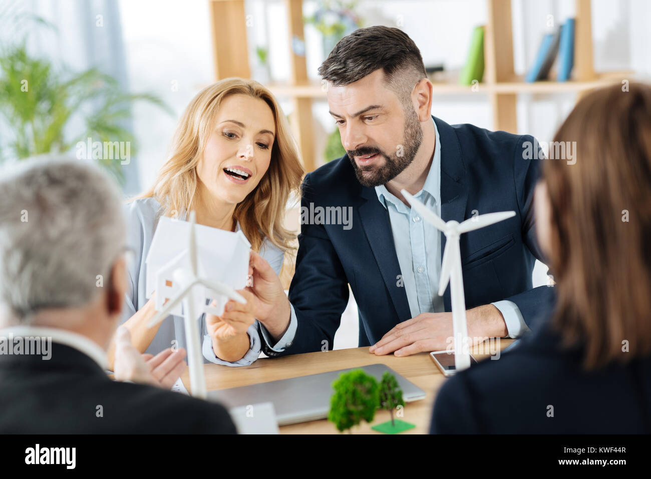 Important invention. Smart creative enthusiastic engineer holding a ...