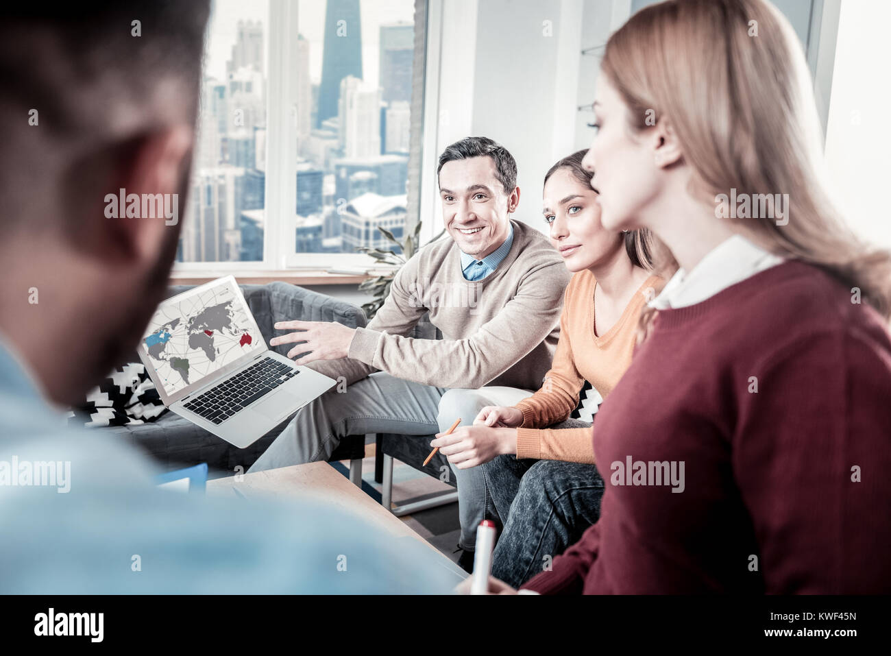 Unexpected statistic. Smart busy nice-looking workers sitting in the ...