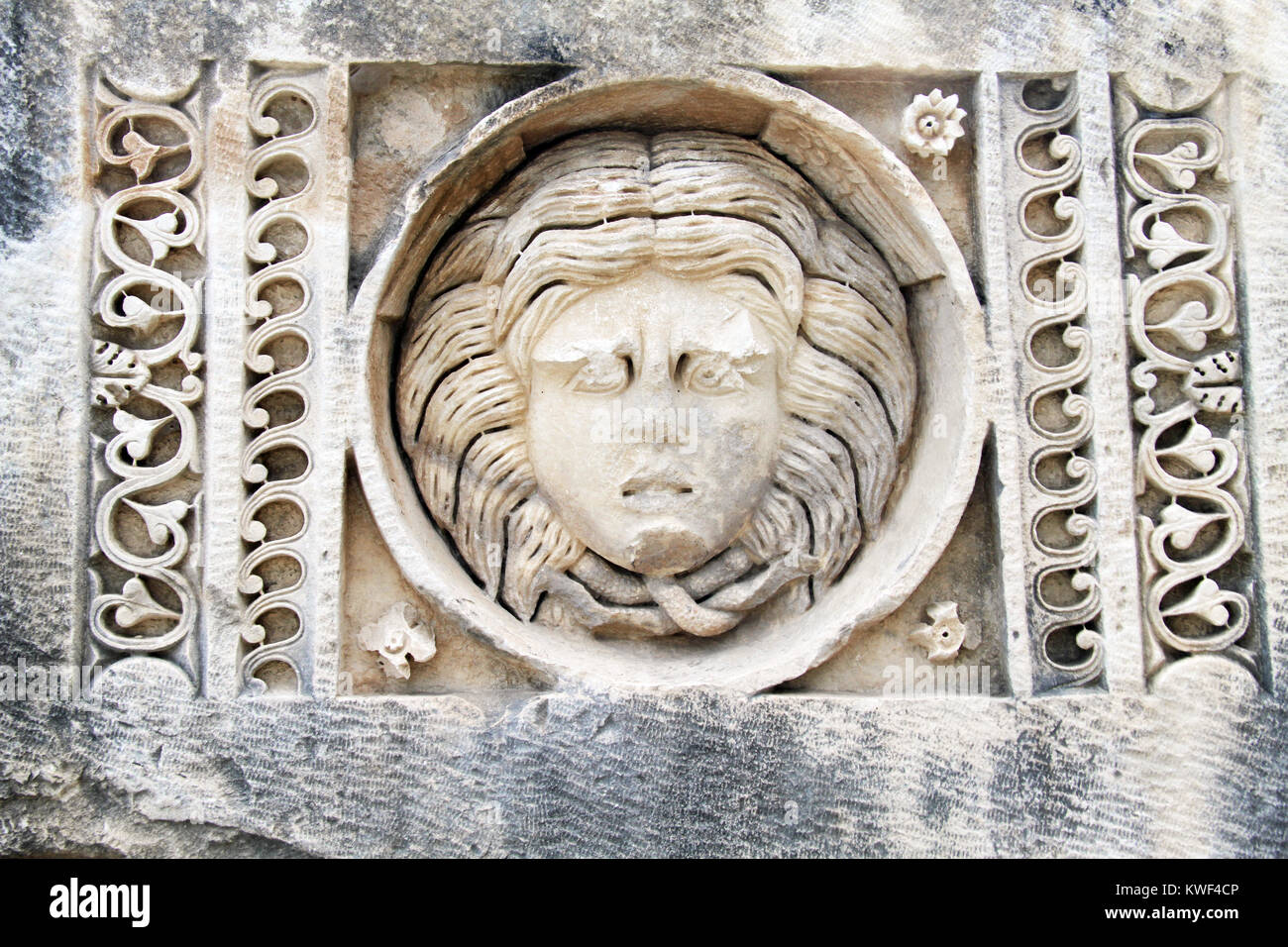 Female mask on stone hi-res stock photography and images - Alamy
