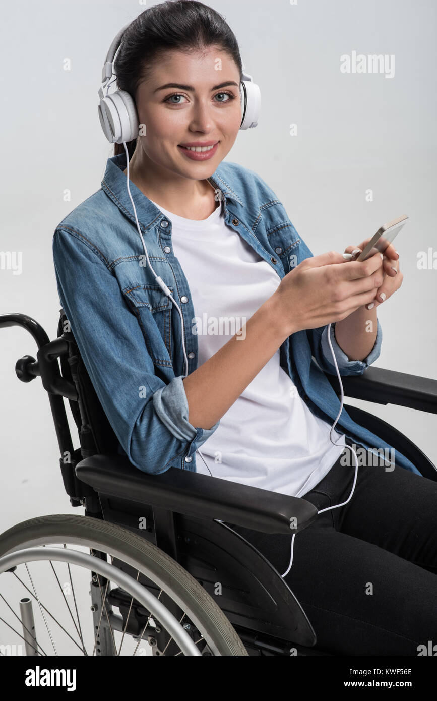 Never give up. Charming nice physically challenged woman wearing ...