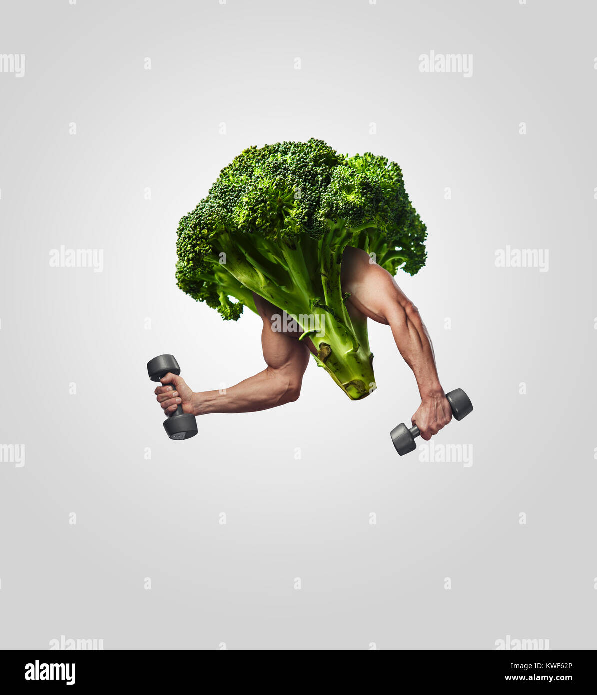 Broccoli with muscular man's hands Stock Photo - Alamy