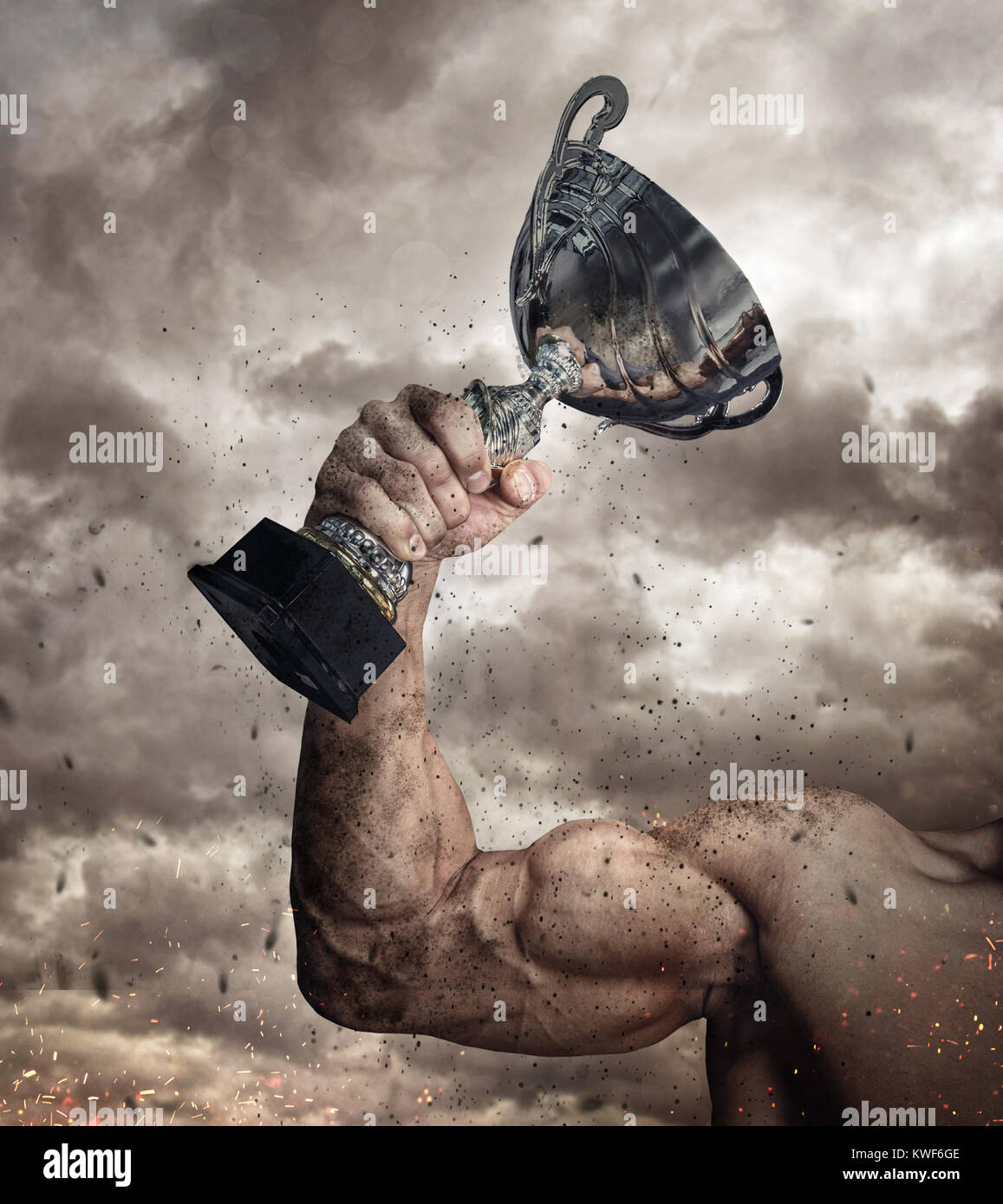 Cropped male arm with winner cup Stock Photo - Alamy