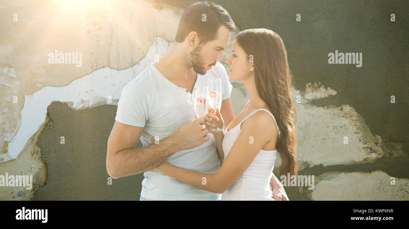 Composite image of young couple embracing each other Stock Photo - Alamy