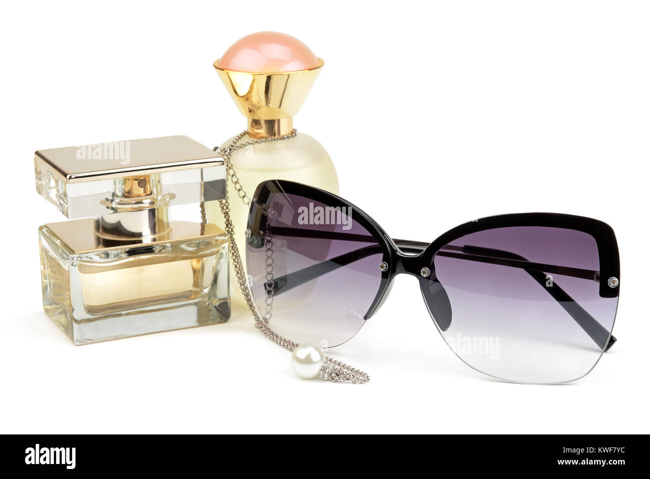 perfume bottles, sunglasses and chain isolated on white background ...