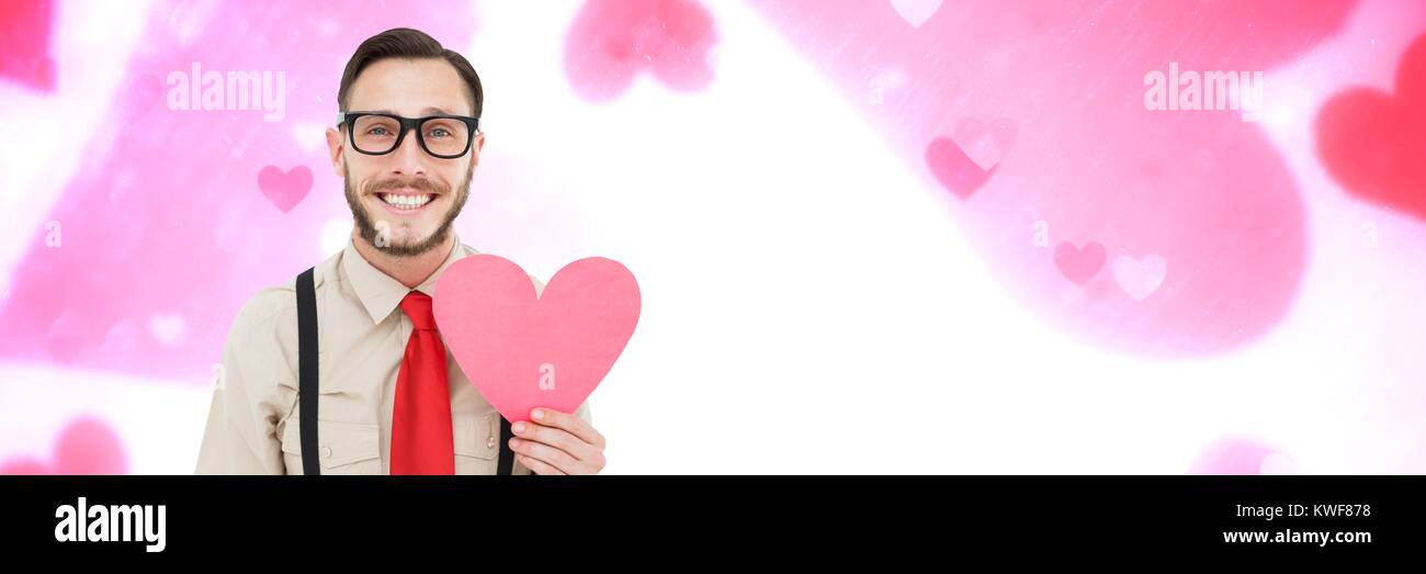 Valentines man holding heart with love hearts background Stock Photo ...