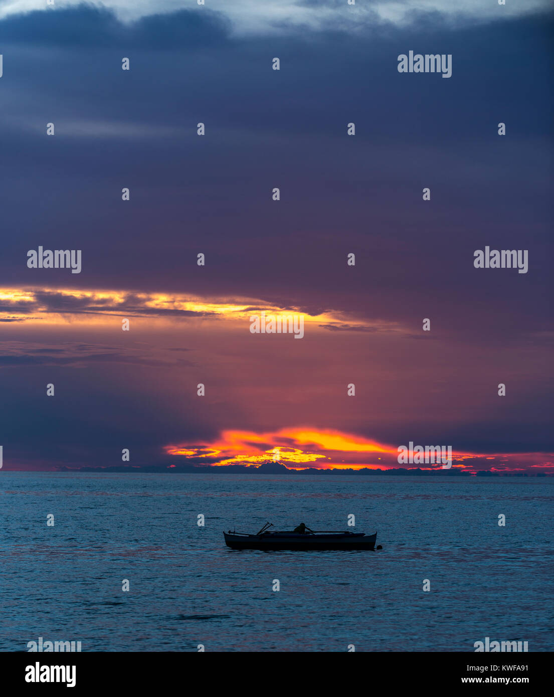 Fisherman reeling in fish hi-res stock photography and images - Alamy