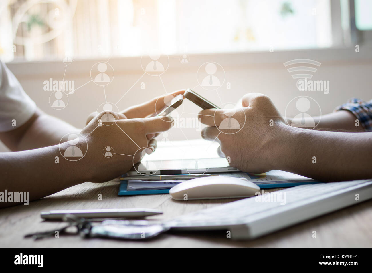 group of people use phone on wood table for connect and communicate ...