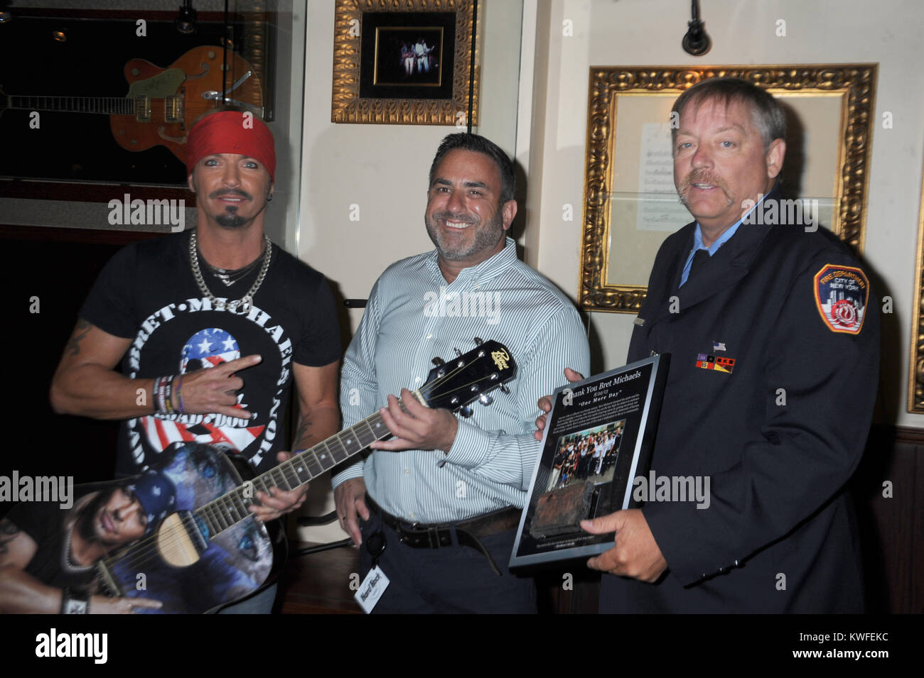 NEW YORK, NY - JULY 18: (L-R) Musician Bret Michaels, FDNY Firefighter ...