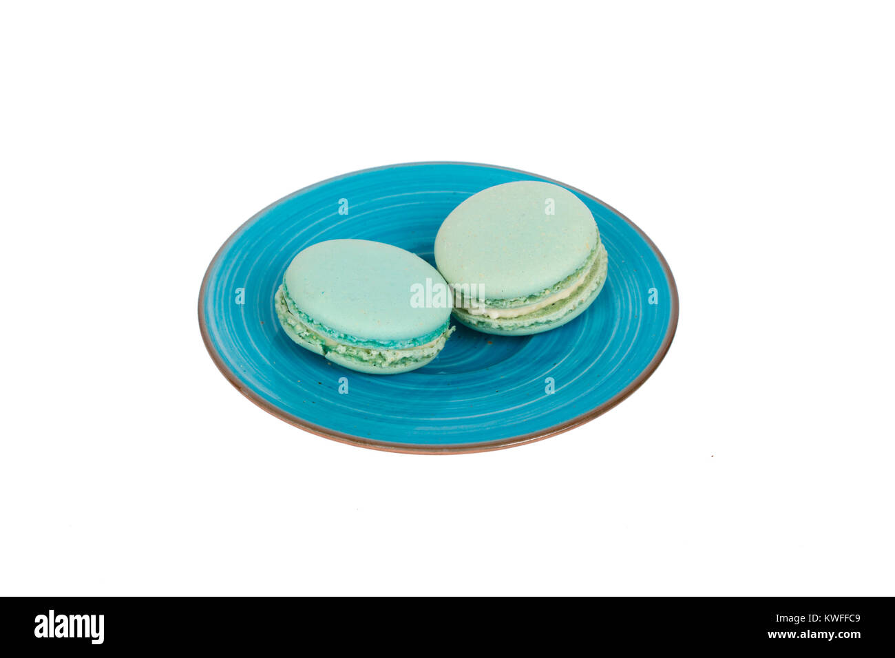 Detailed view of colorful tasty and yummy macarons served in plate ...