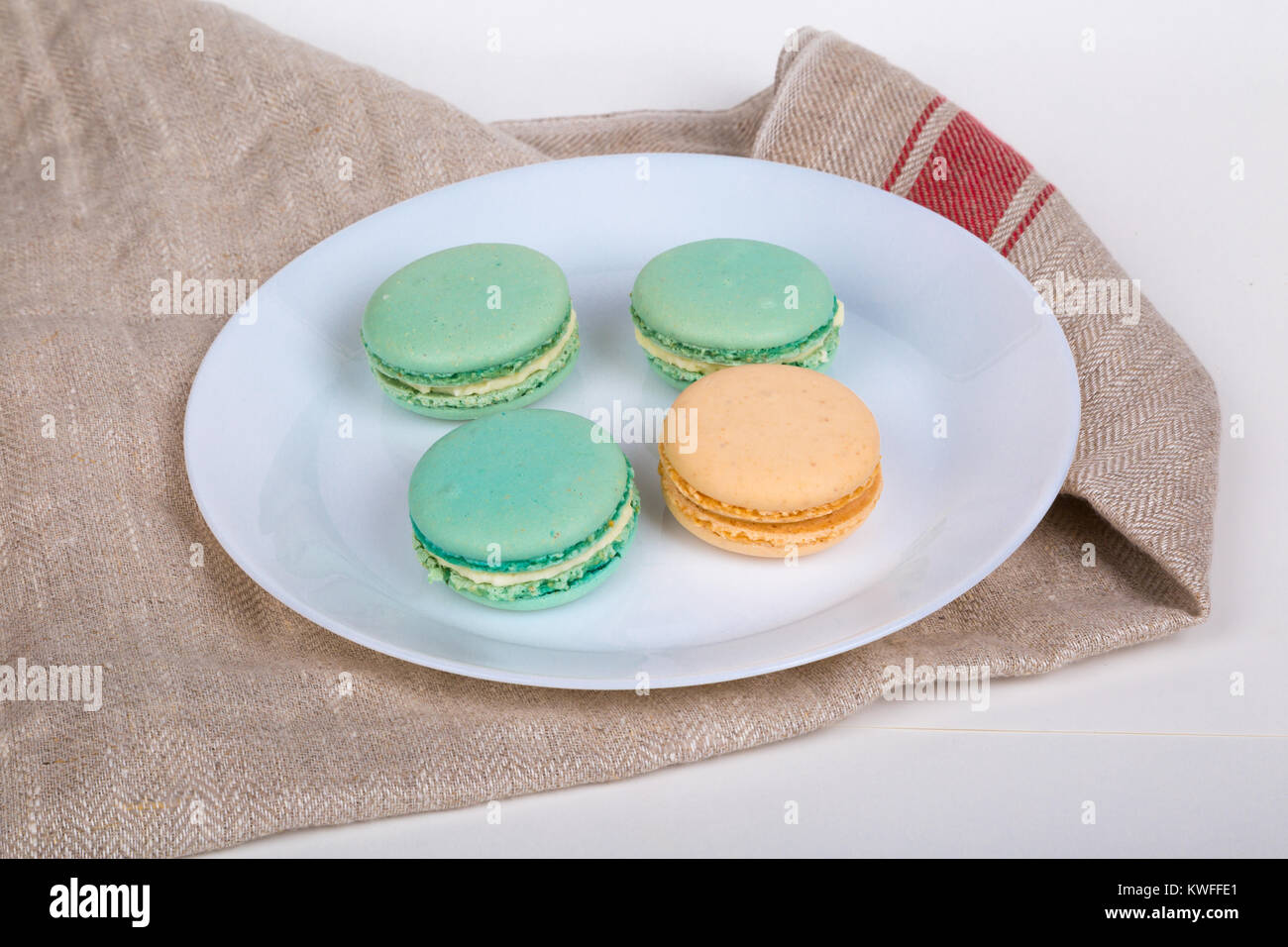 Detailed view of colorful tasty and yummy macarons served in plate ...