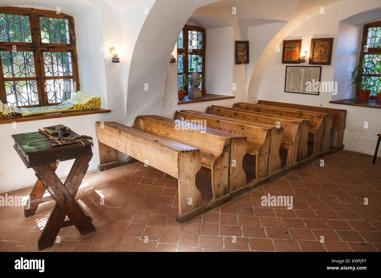 Classroom and wooden bench seats in the First Romanian School Museum ...
