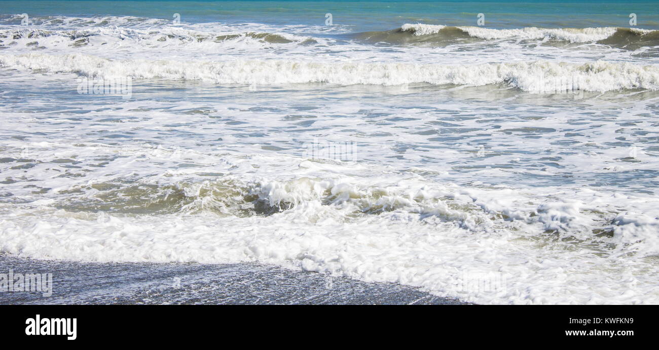Close up image of waves coming in on Otaki Beach on the Kapiti Coast of ...