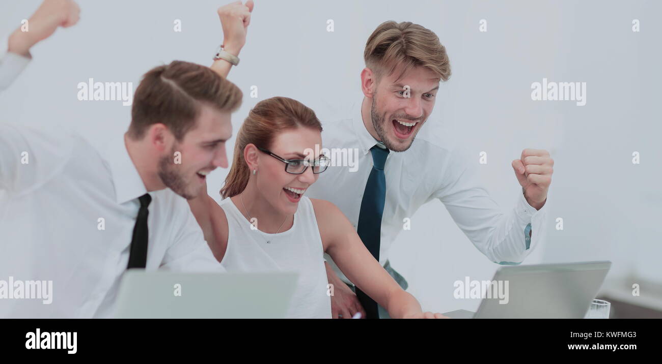 Business team celebrating a triumph with arms up Stock Photo - Alamy
