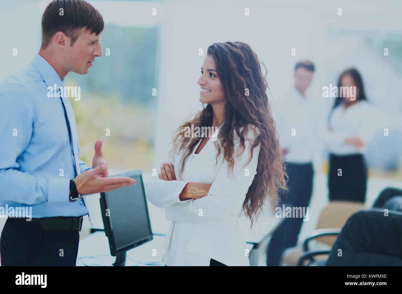 Business - meeting in office, two managers are discussing a docu Stock ...