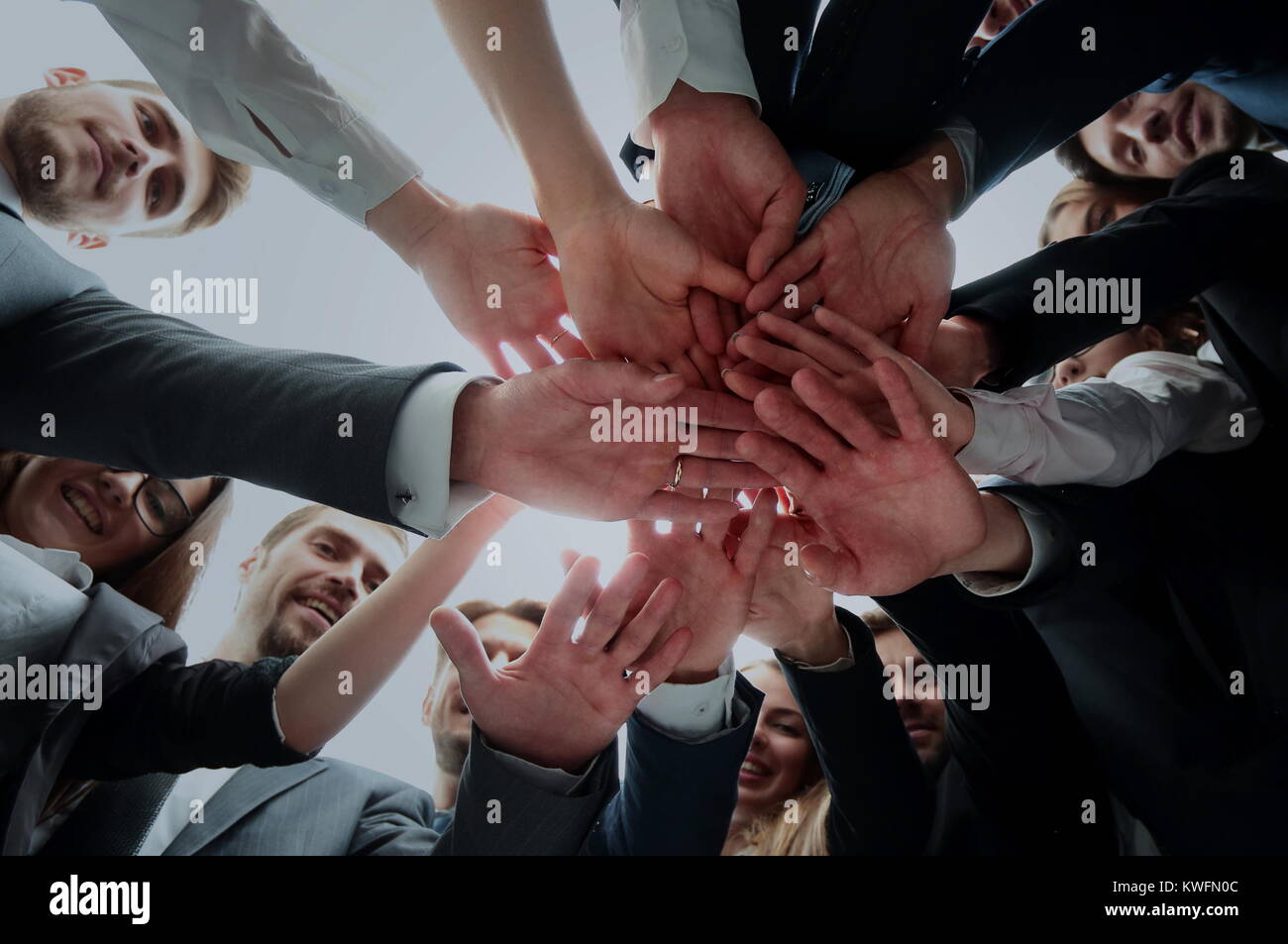 Large successfull business team showing unity with their hands t Stock ...