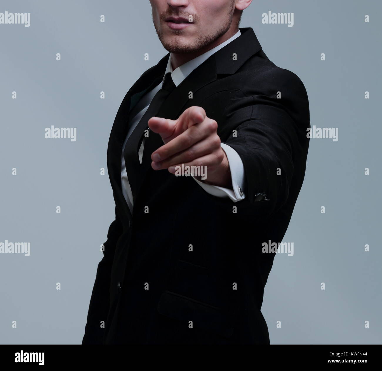 Portrait of a successful business man showing his index finger Stock ...