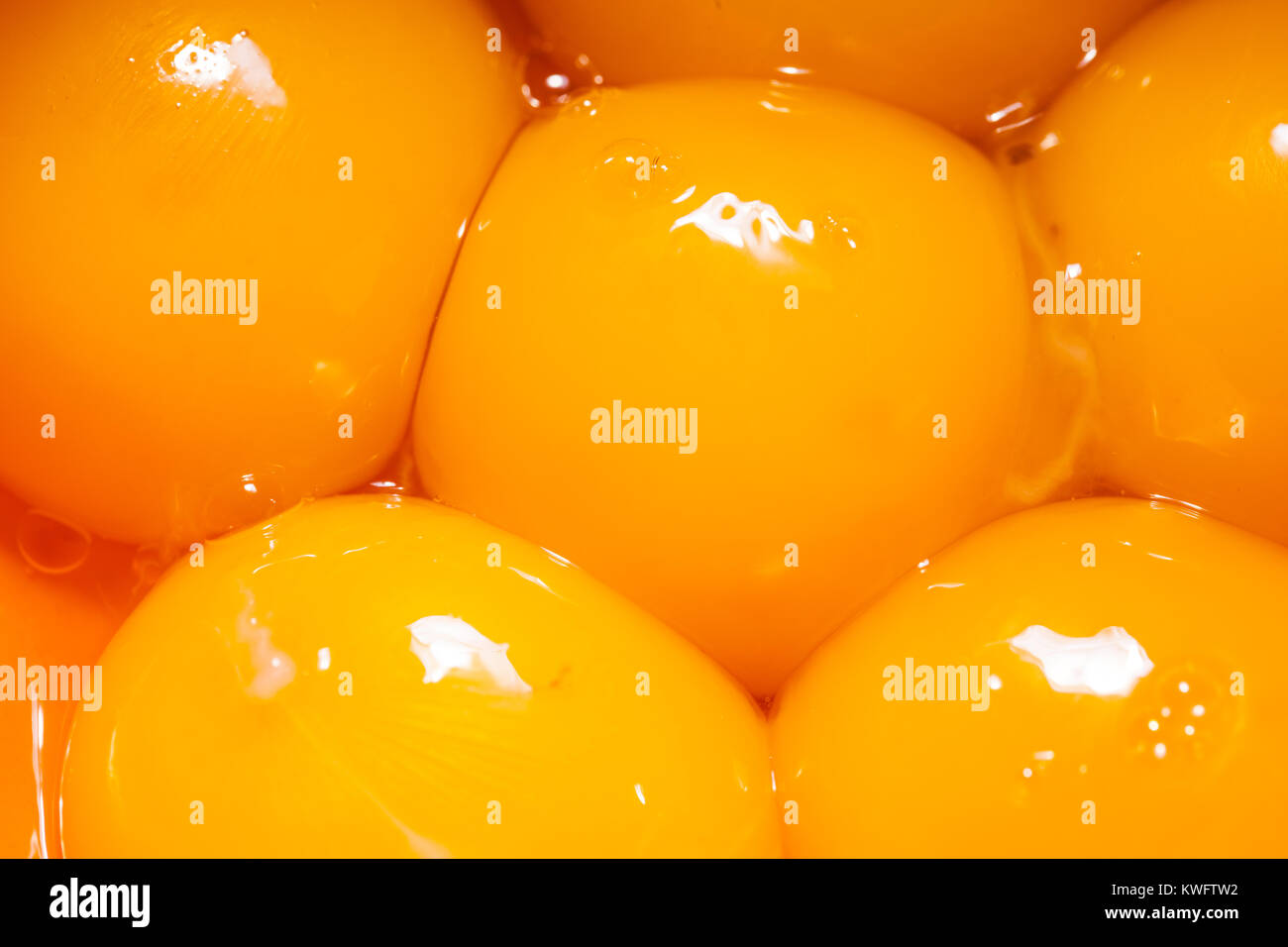 Close-up of raw egg yolks Stock Photo - Alamy