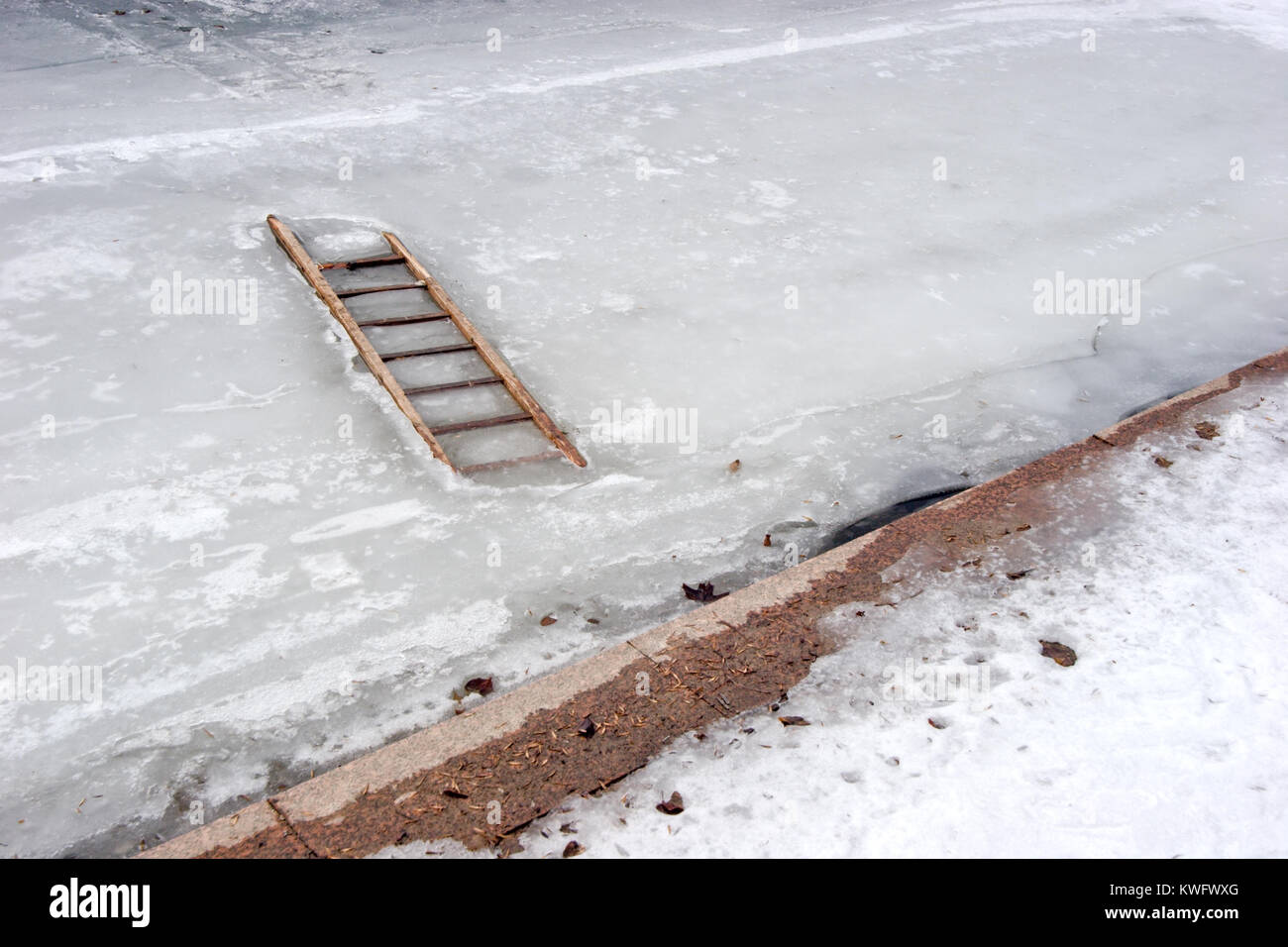 Wooden stairs Frozen in river near water's edge Stock Photo - Alamy
