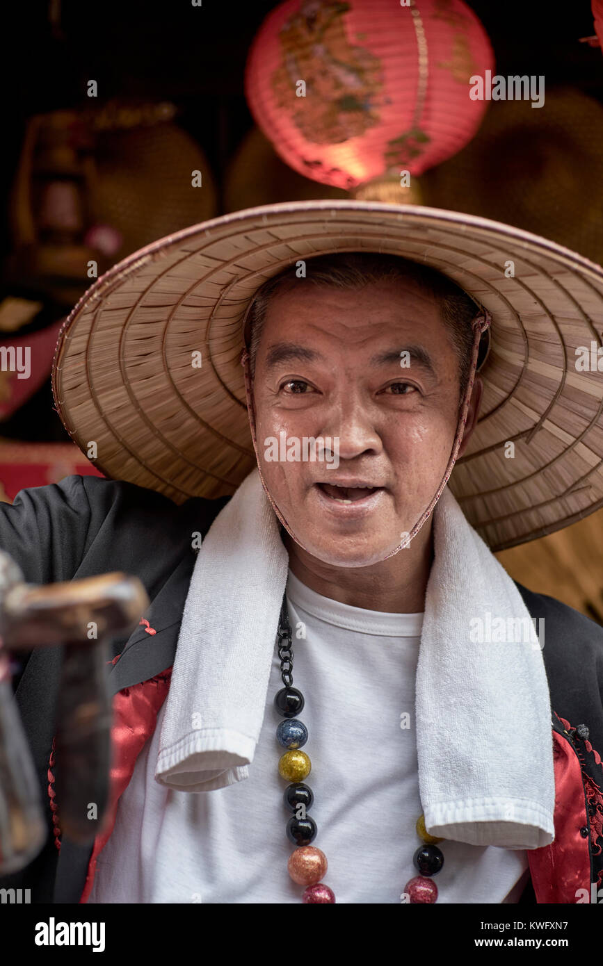 Chinatown street vendor. Portrait Asian man Stock Photo - Alamy