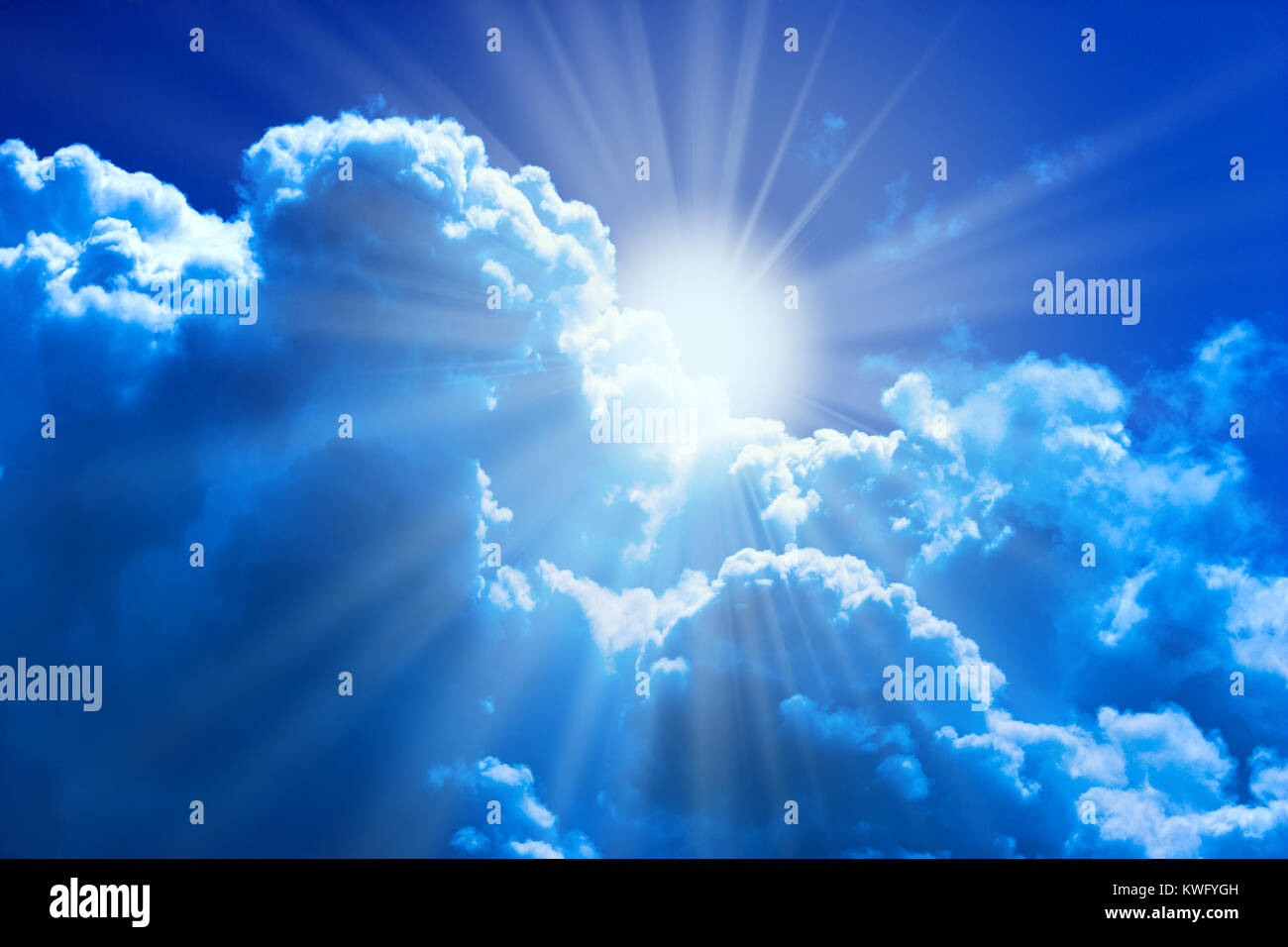 Sun and clouds beautiful natural religion background Stock Photo - Alamy