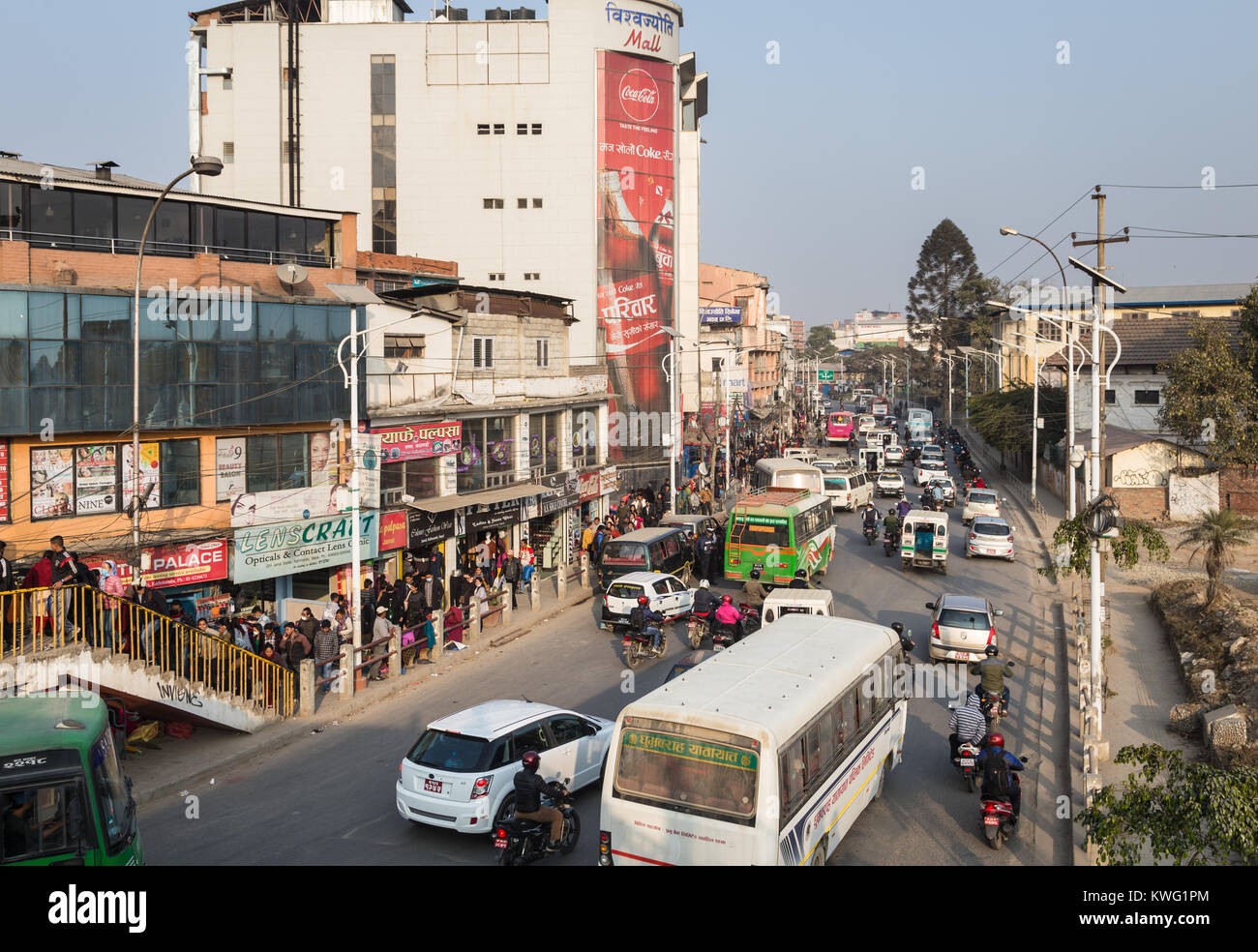 KATHMANDU, NEPAL - NOVEMBER 30, 2017: Cars, motorcycles and buses drive ...