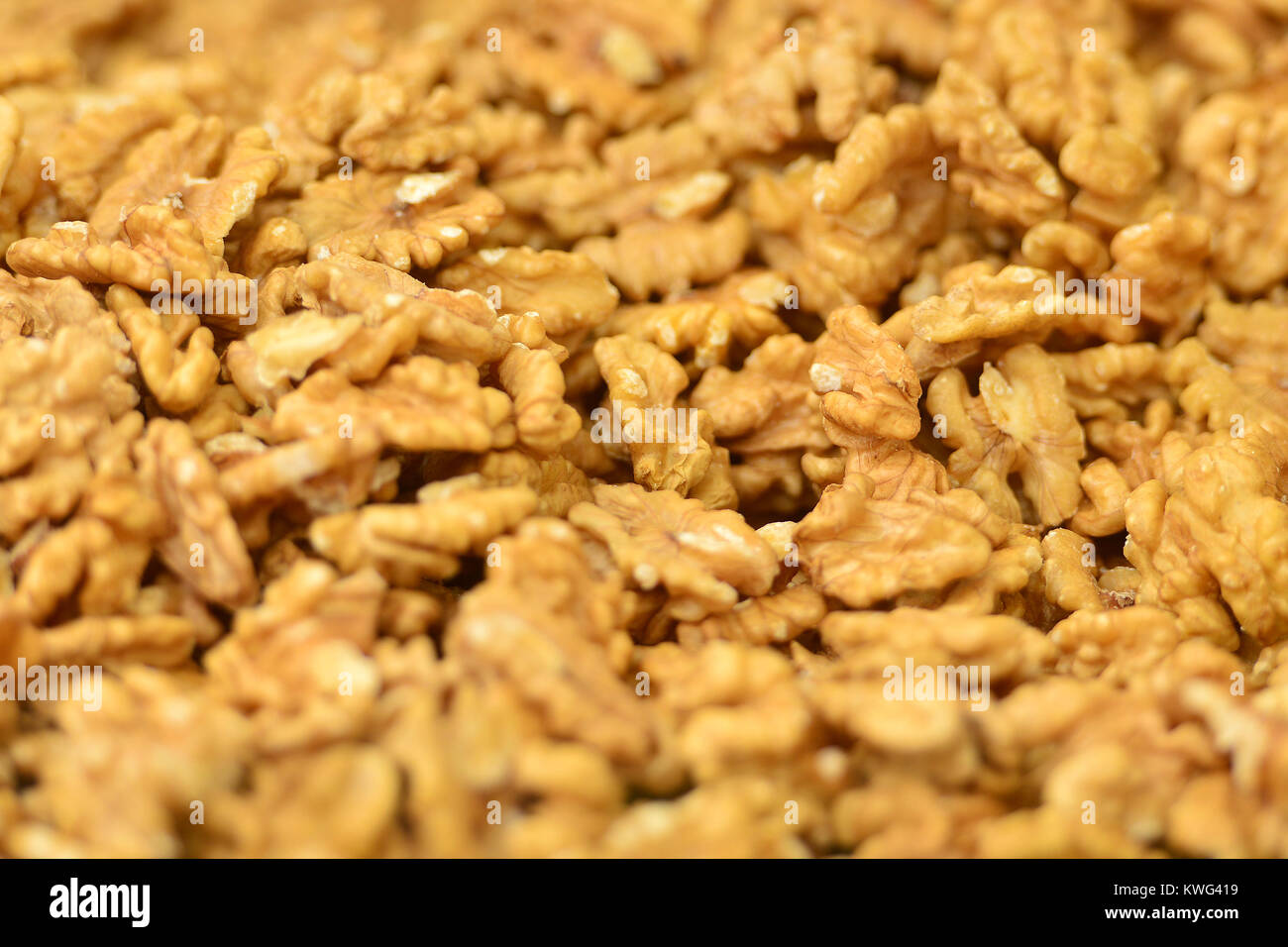 Peeled walnuts background Stock Photo - Alamy
