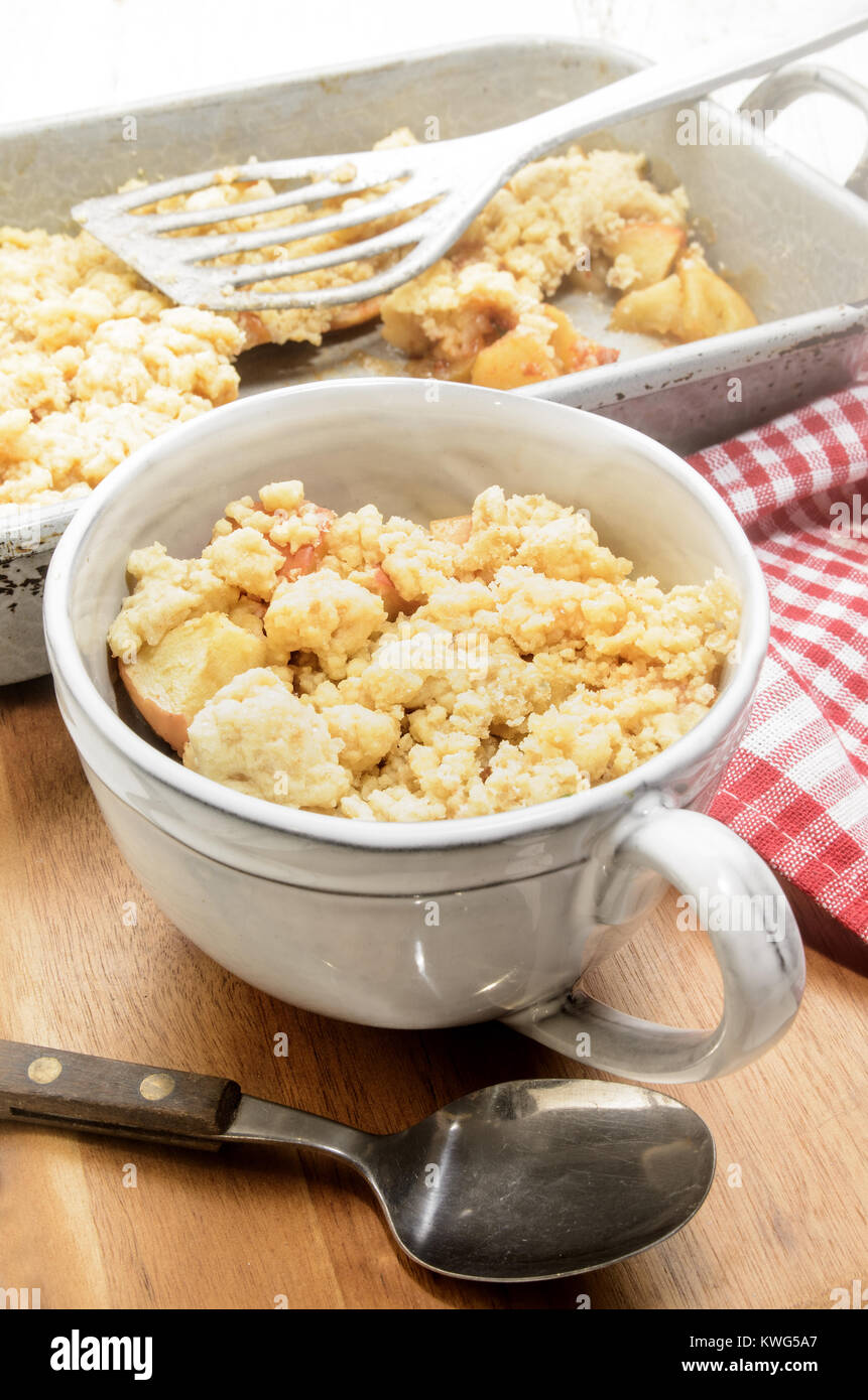 home made british apple crumble cake in a cup Stock Photo - Alamy