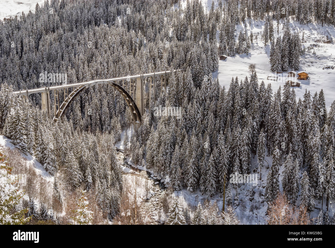 Langwies Bridge in a winter mountain landscape near Arosa, Grisons ...