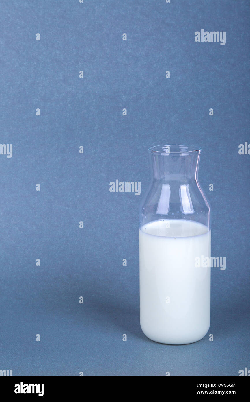 Single milk in bottle, on dark background Stock Photo - Alamy