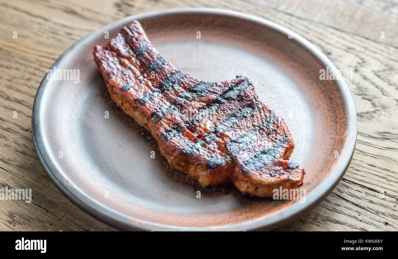 Portion of grilled pork ribs Stock Photo - Alamy