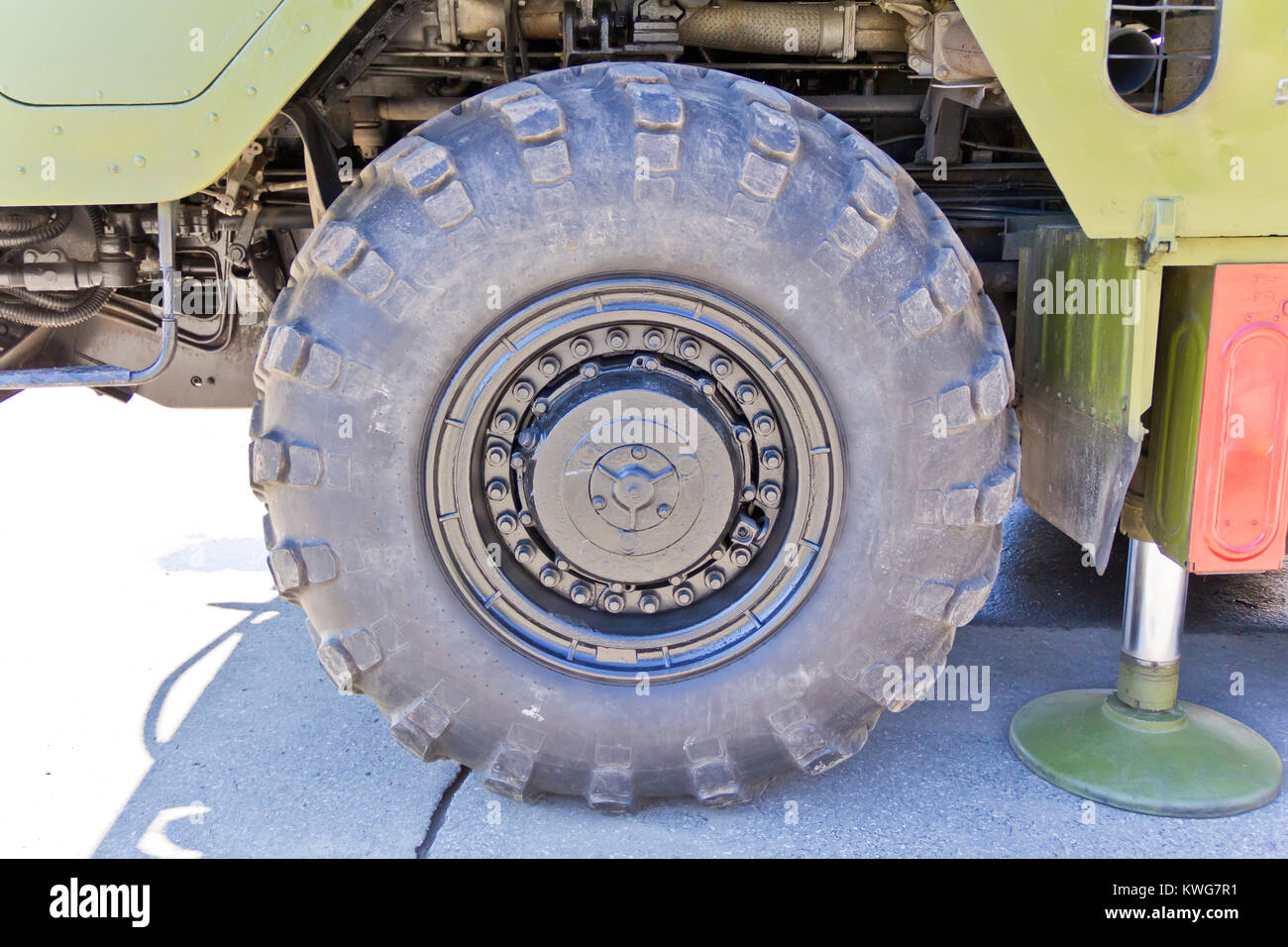 Wheel of military machine at the exhibition under open sky Stock Photo ...