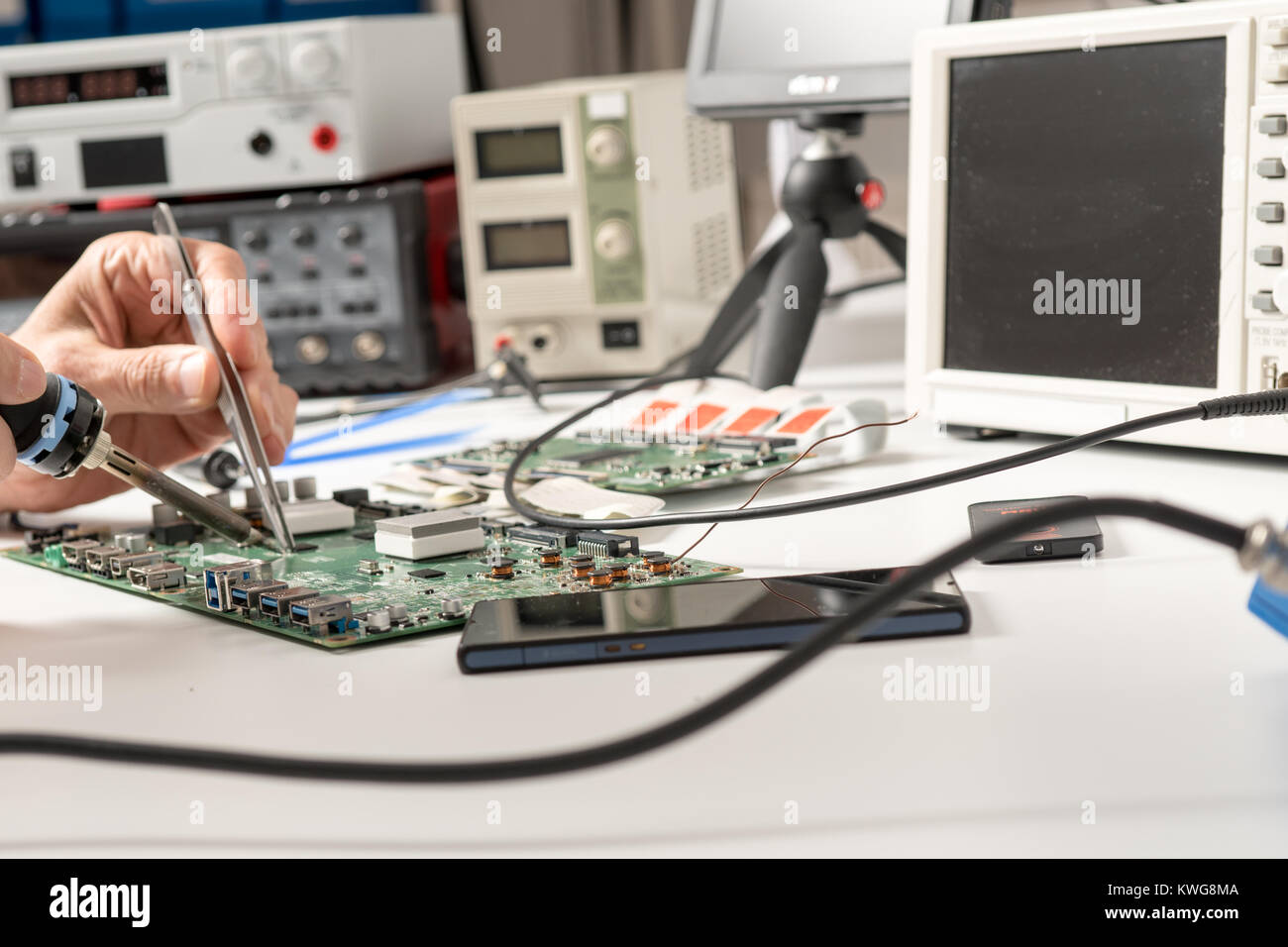 To repair the PCB of a modern monitor at the service center. Laboratory ...