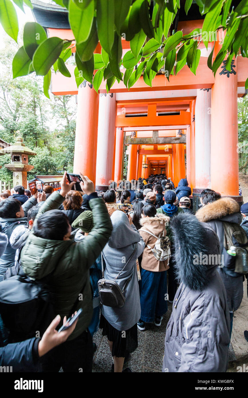 Japan, Kyoto, Fushimi Inari Taisha. Crowds of people on their hatsumode ...