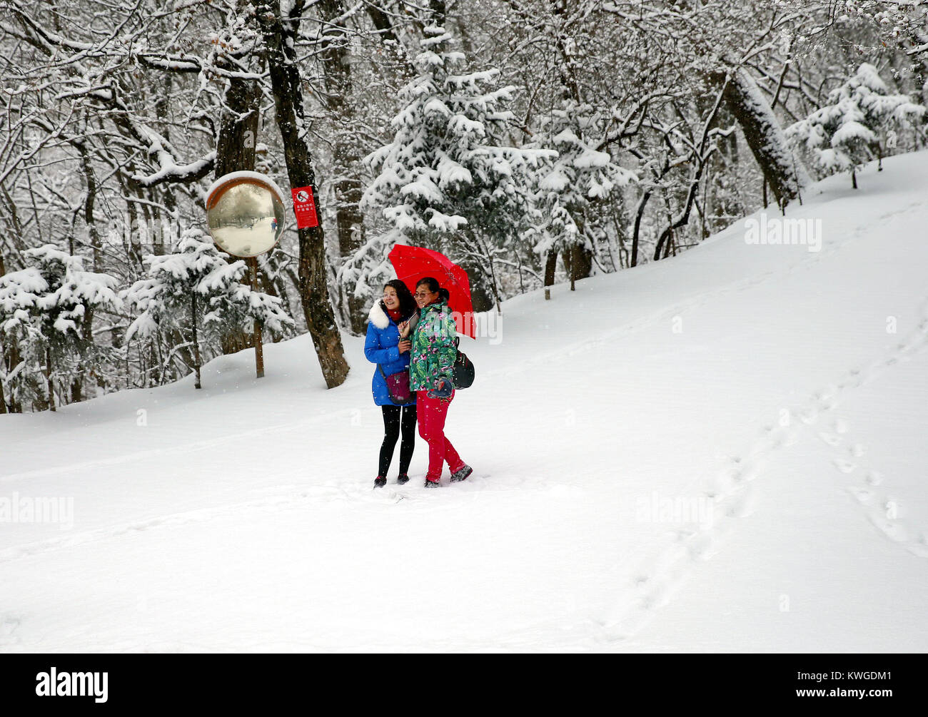 Pingliang, China's Gansu Province. 3rd Jan, 2018. Tourists pose for ...