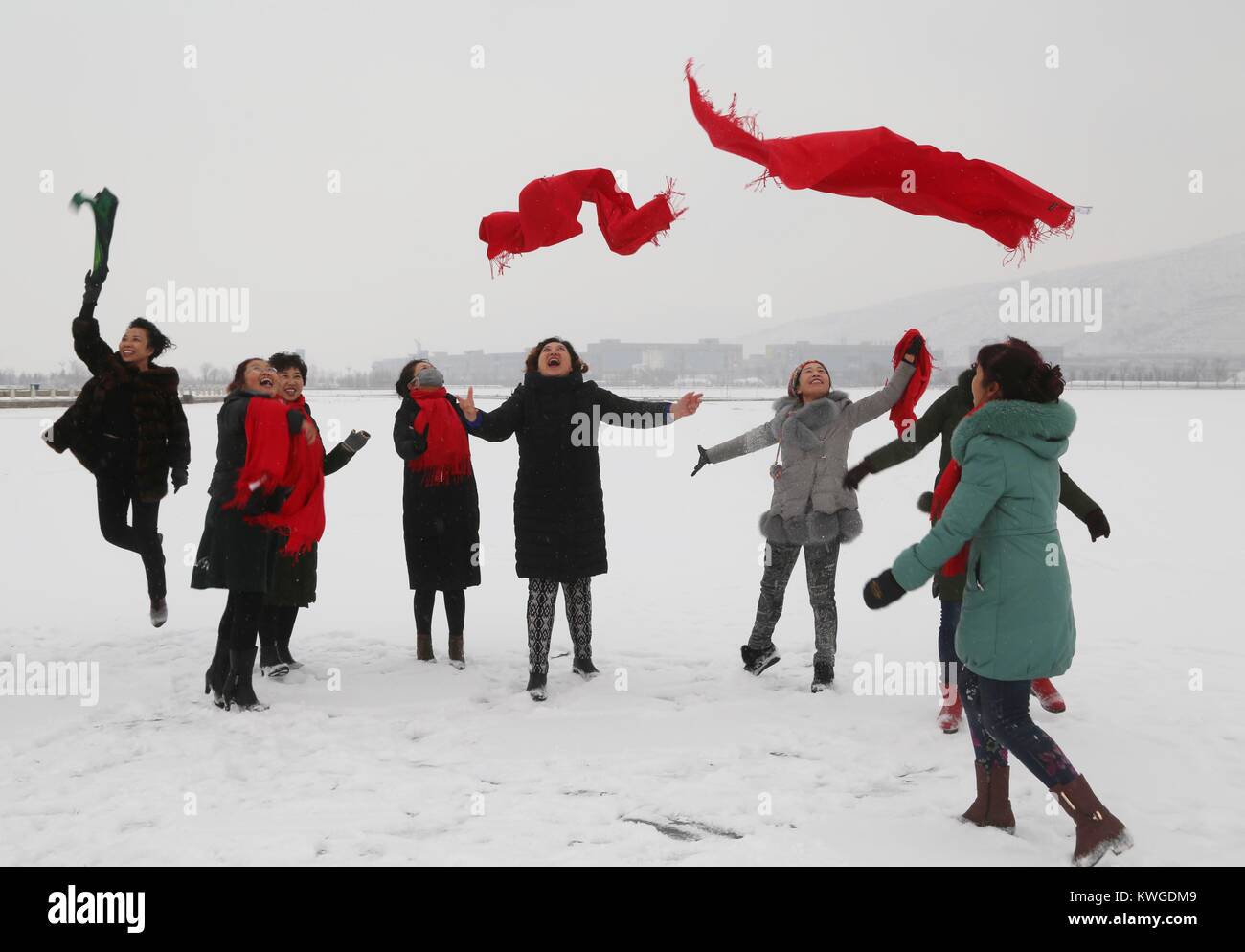 Dingxi, China's Gansu Province. 3rd Jan, 2018. People have fun at a ...