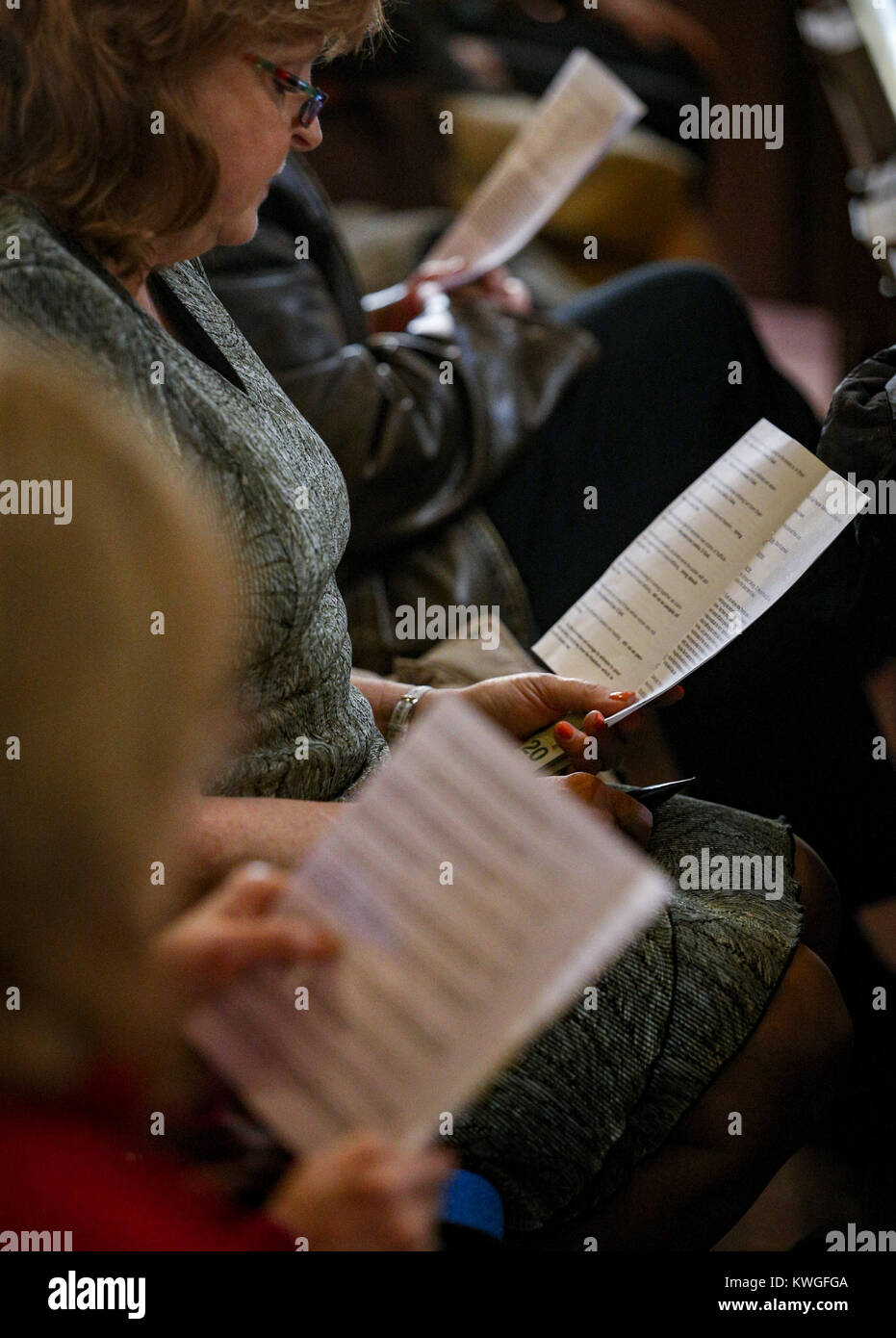 Davenport, Iowa, USA. 5th Feb, 2017. Gathered guests recite a closing ...